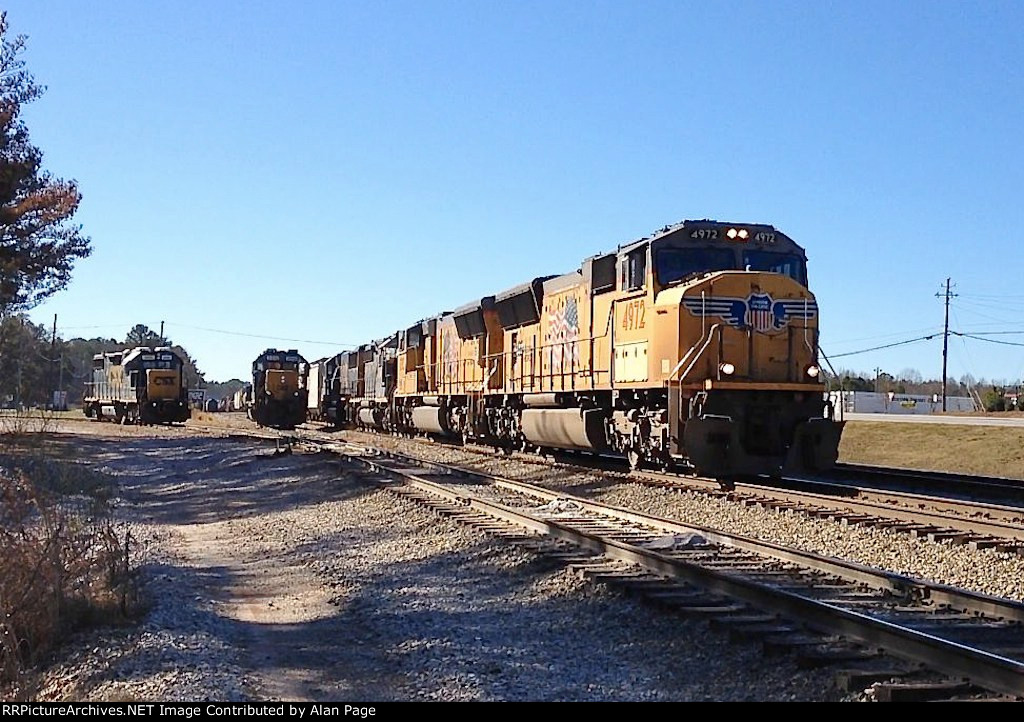 UP SD70Ms 4972 and 3783 lead CSX SD40-2 8097 and SD60 8717